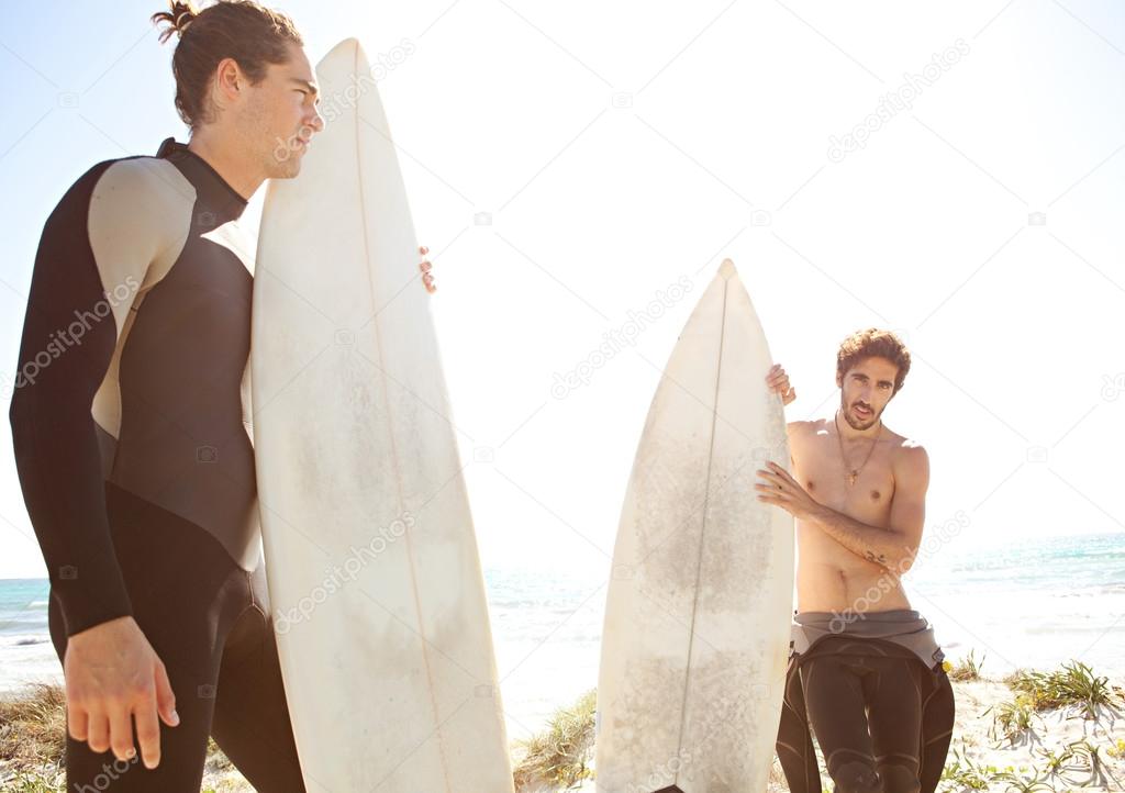 Two young surfer friends Stock Photo by ©mjth 45812171