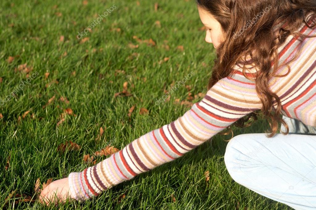 Young child girl crouching Stock Photo by ©mjth 46730785