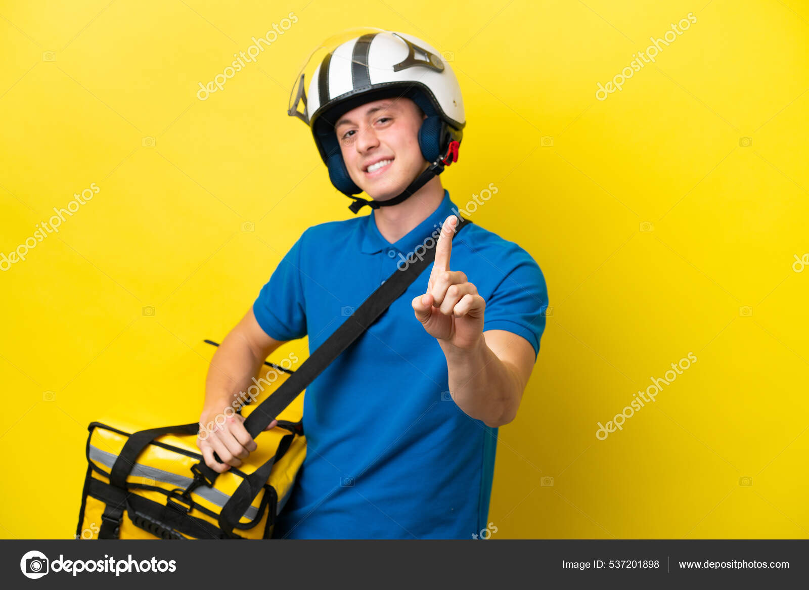 Young Brazilian Man Thermal Backpack Isolated Yellow Background Showing ...