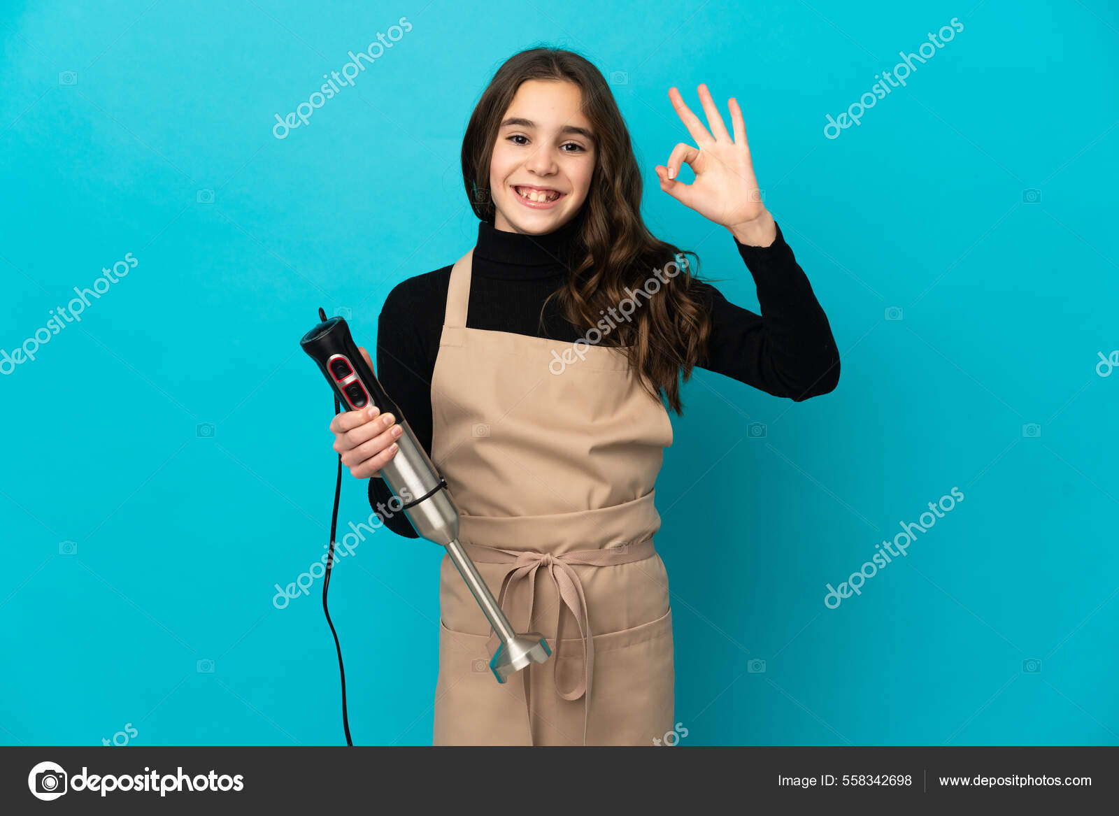 Little Girl Using Hand Blender Isolated Blue Background Showing Sign ...