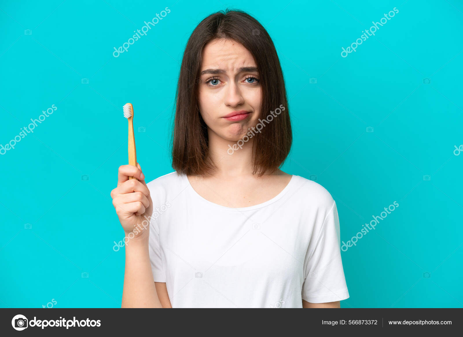 Young Ukrainian Woman Brushing Teeth Isolated Blue Background Sad ...