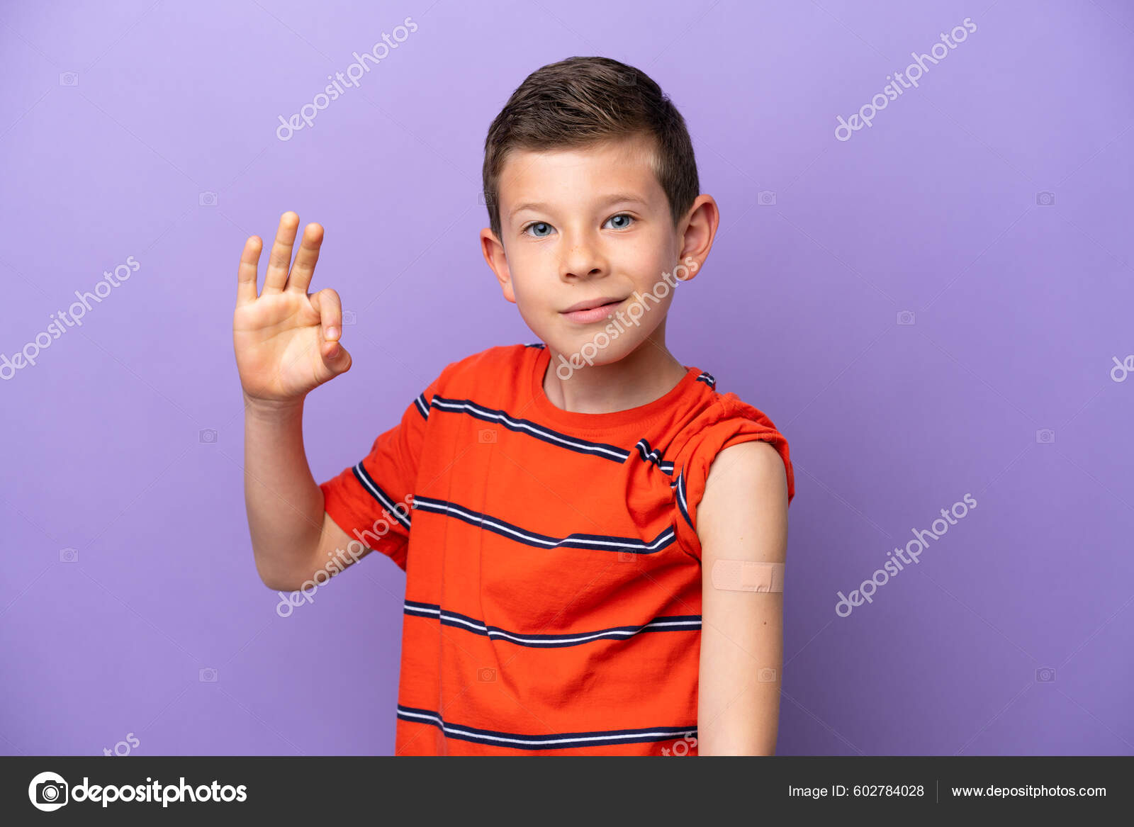Little Boy Wearing Band Aid Isolated Purple Background Showing Sign ...