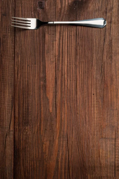 Two fork tied by string on old wood, background Stock Photo by ©lvenks ...