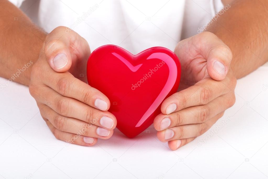 Hands protecting heart — Stock Photo © Dutko #48149503