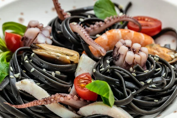 Squid ink pasta Stock Photos, Royalty Free Squid ink pasta Images ...