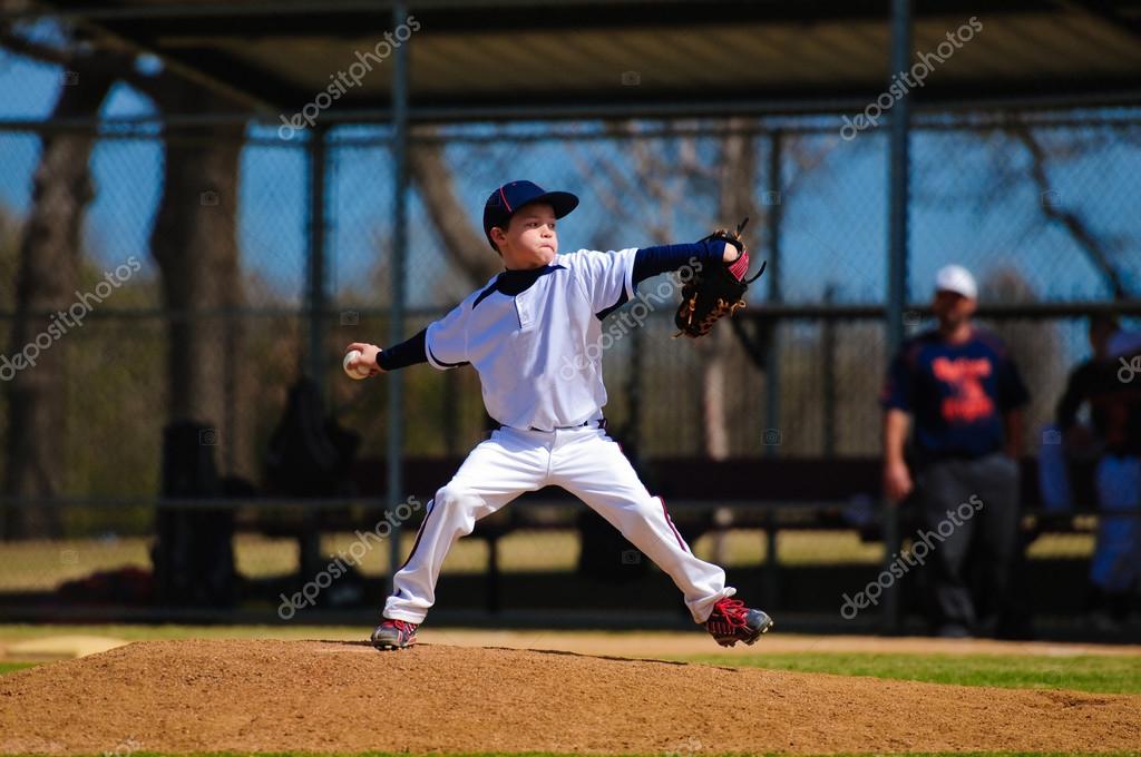 Baseball pitcher throwing ball to the batter Stock Photo by ...