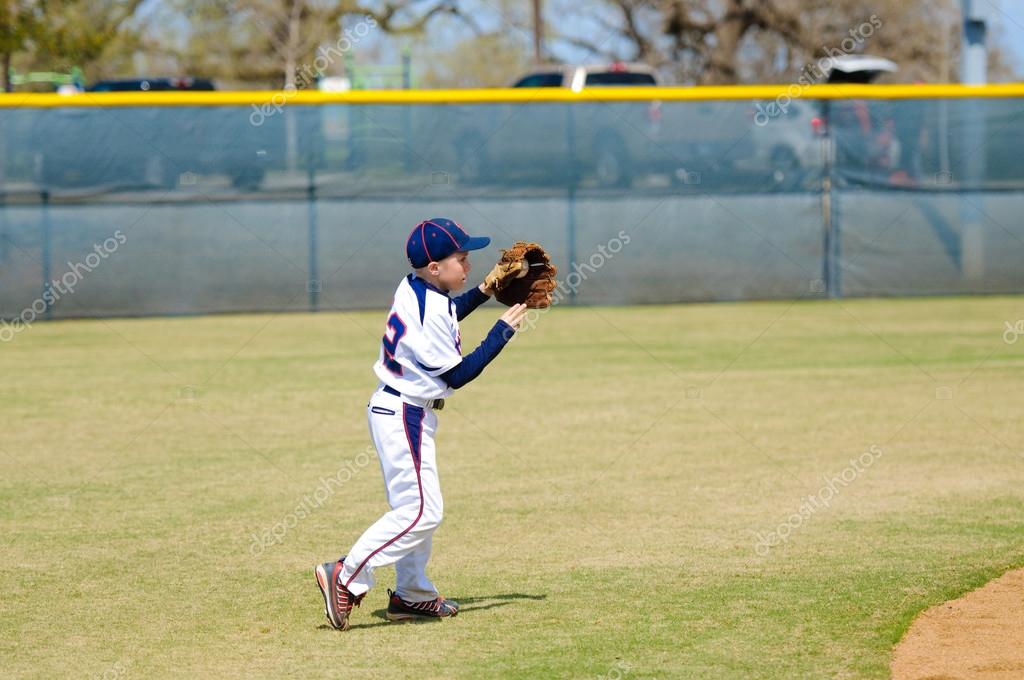 Youth shortstop about to throw ball Stock Photo by ©tammykayphoto 22571255