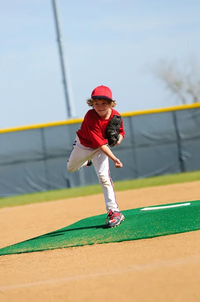 Little league pitcher starting his wind up. Stock Photo by ...
