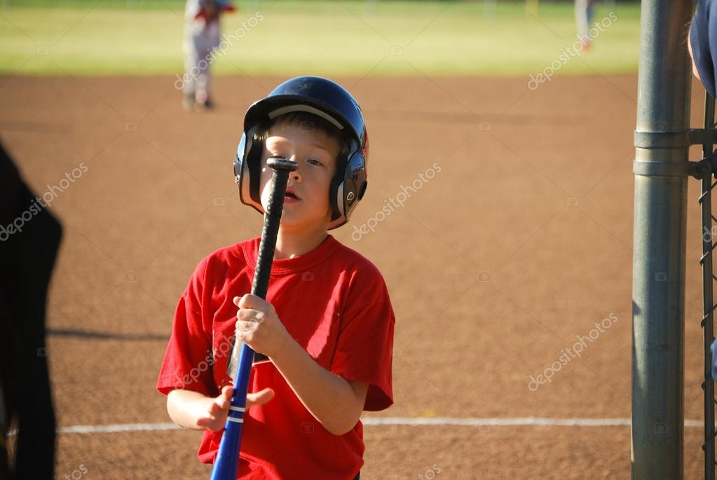 Baseball boy staring at bat Stock Photo by ©tammykayphoto 27731639