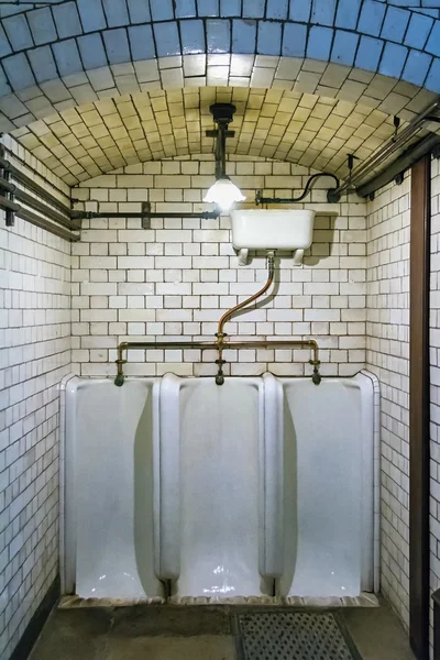 retro urinal in the old restaurant - Stock Image - Everypixel