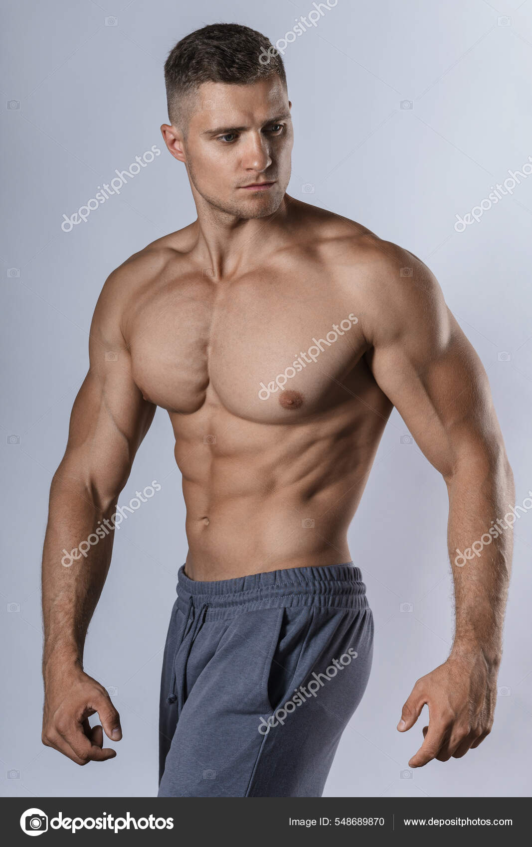 Young Man Bodybuilder Showing His Muscular Body Gray Background Stock ...