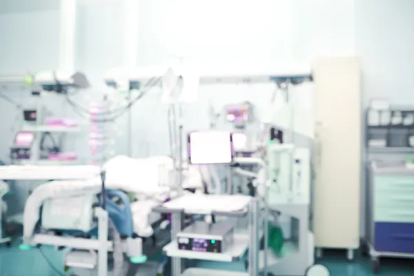 Critically ill patient surrounded by medical technologies in the ICU ...