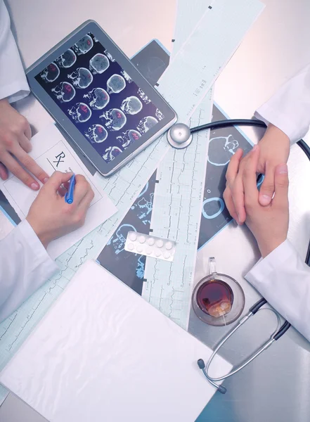 Two doctors at the table - Stock Image - Everypixel