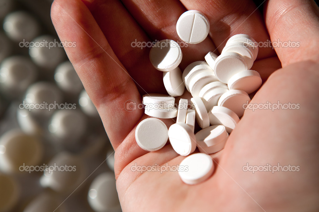 Tablets in hand Stock Photo by ©vsurkov 22915322