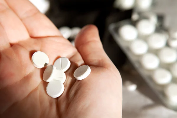 Tablets in hand Stock Photo by ©vsurkov 22915322