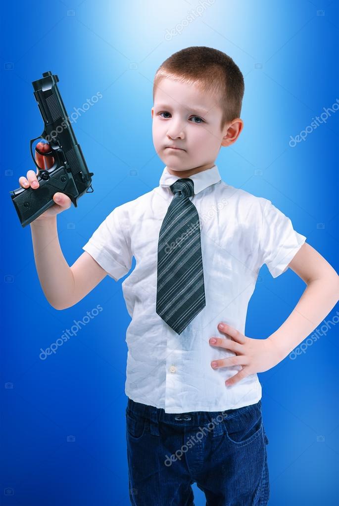 Boy with gun ⬇ Stock Photo, Image by © mirumisiura #43827797