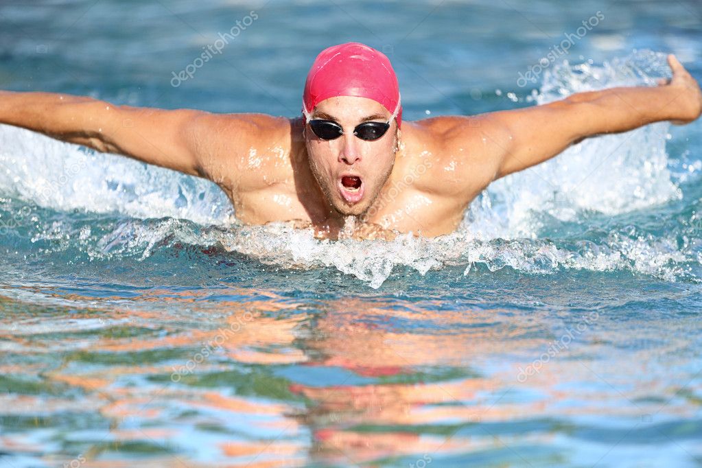 Swimmer athletic man swimming butterfly Stock Photo by ©Maridav 26346069