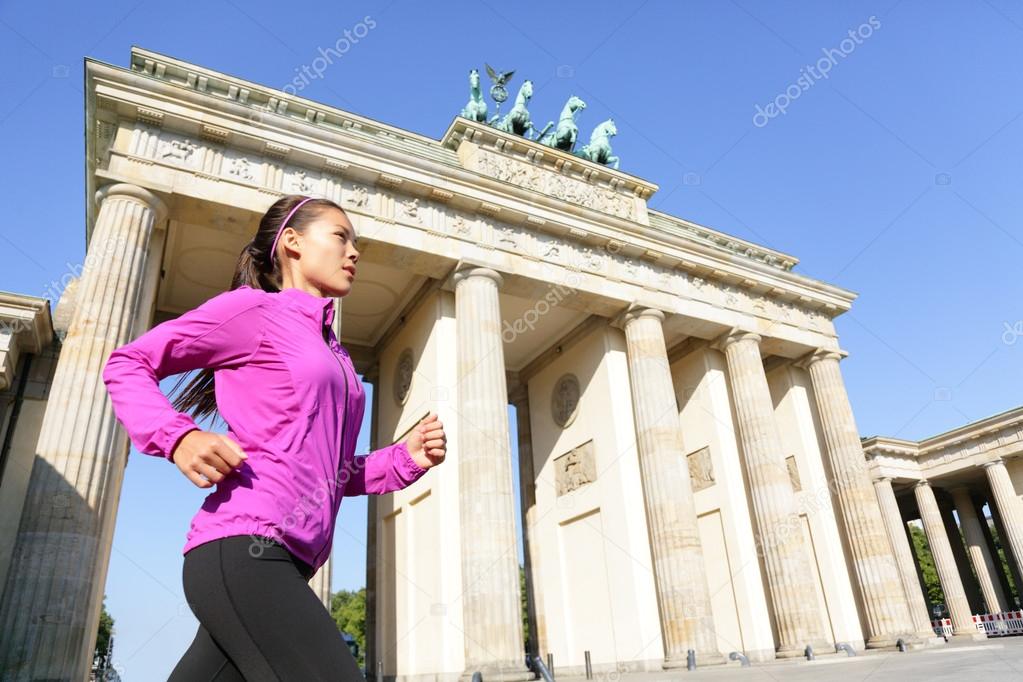 Running woman in Berlin, Germany — Stock Photo © Maridav #40836525