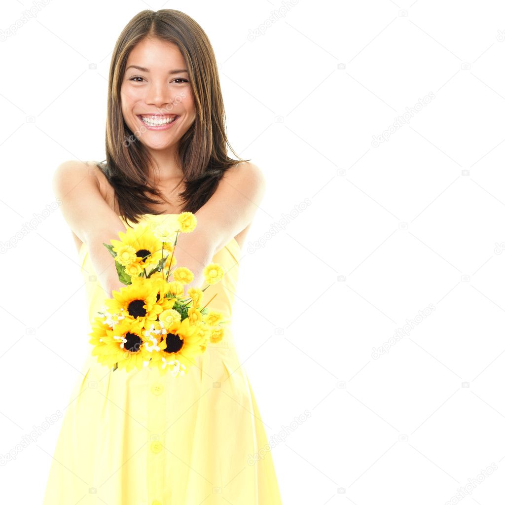 Woman smiling showing flowers — Stock Photo © Ariwasabi #21568201