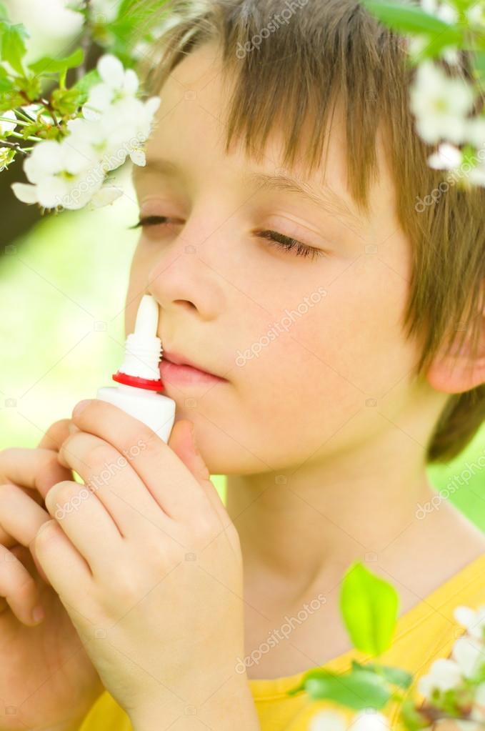 Child spraying his nose — Stock Photo © kolinko_tanya #36846395