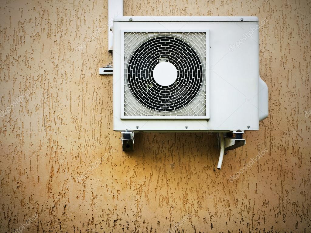 Gray air conditioner on a wall — Stock Photo © grebcha #21822421