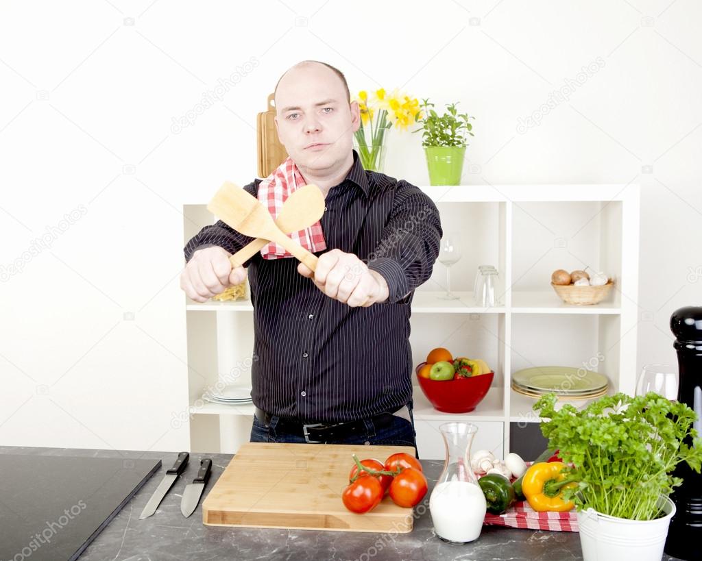 Man preparing to start cooking a meal — Stock Photo © sebastiangauert ...