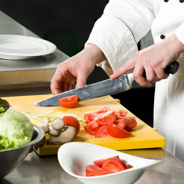 Chef preparing salad Stock Photo by ©asmfoto 38929323