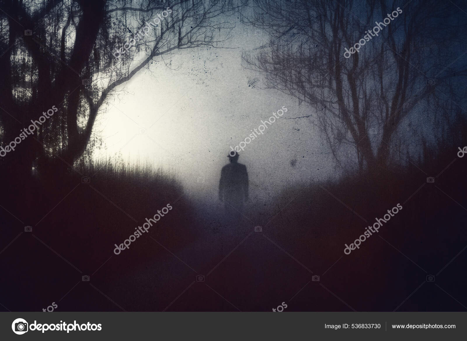 Man Standing In The Dark