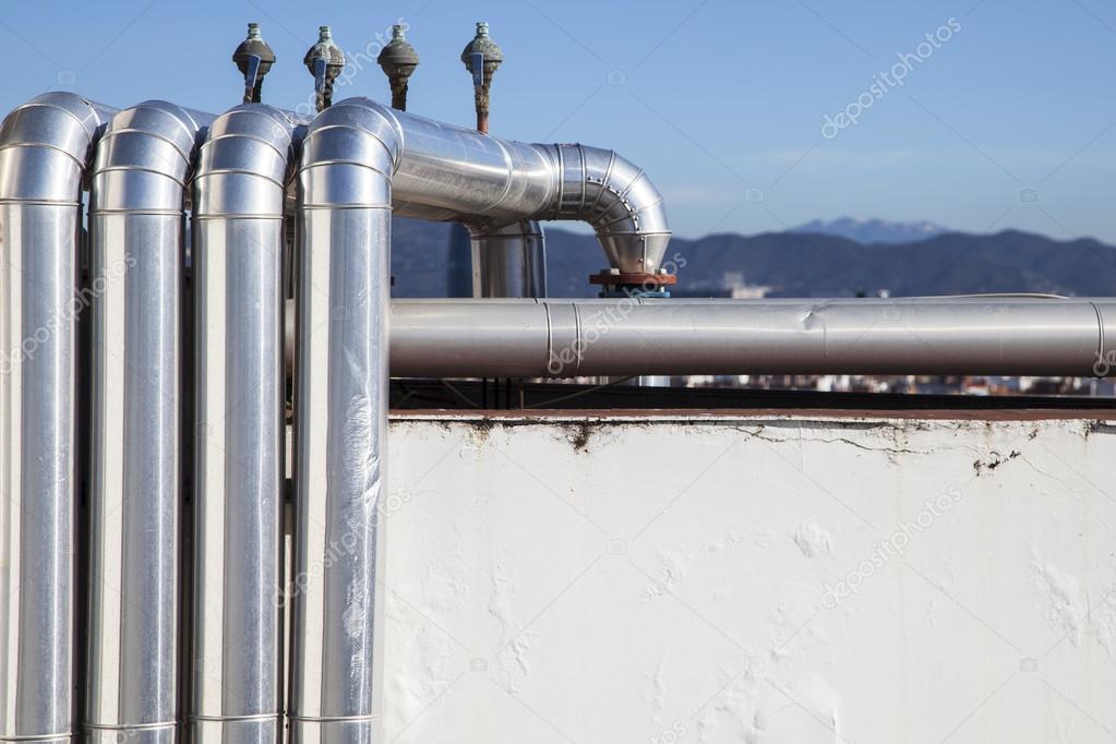 Silver tubes with securities valves. — Stock Photo © ulldellebre #22676591