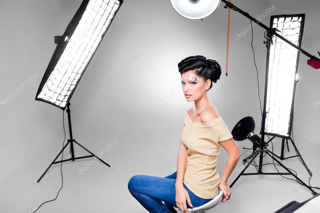 Young model posing in professionally equipped studio — Stock Photo ...