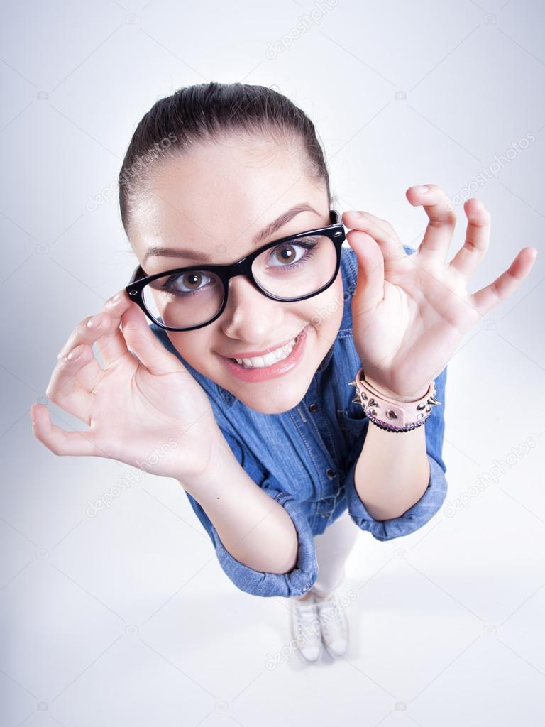 Pretty girl with perfect teeth wearing geek glasses smiling — Stock ...