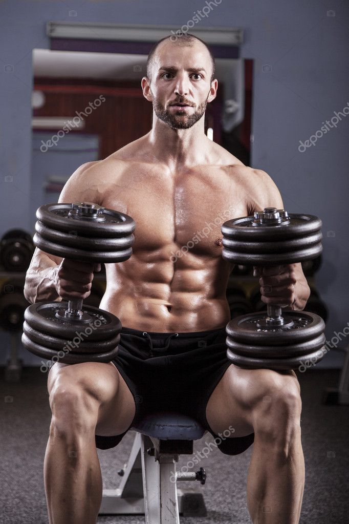 Powerful muscular man — Stock Photo © miljan010 #21839291