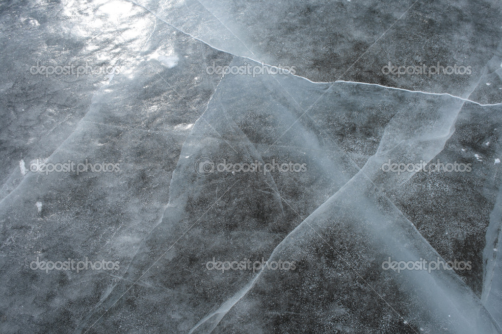Sun reflecting in the cracked ice surface — Stock Photo ...