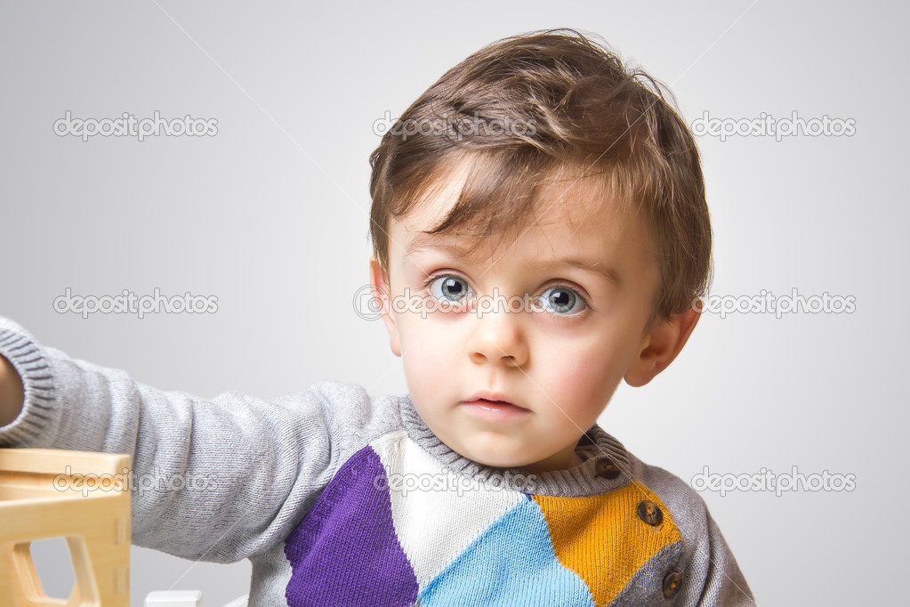 Child staring at the camera Stock Photo by ©dynamicfoto 41278613