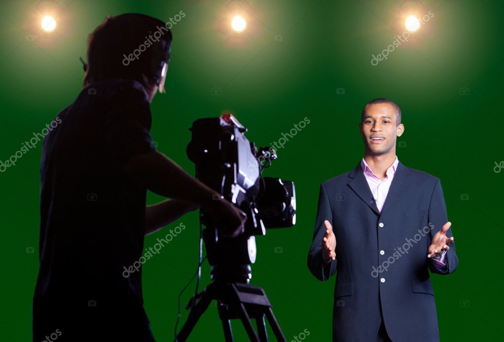 Presenter piece to camera in TV Studio — Stock Photo © antb #21507479