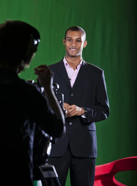 TV Presenter Reads Scripts Stock Photo by ©antb 31526913