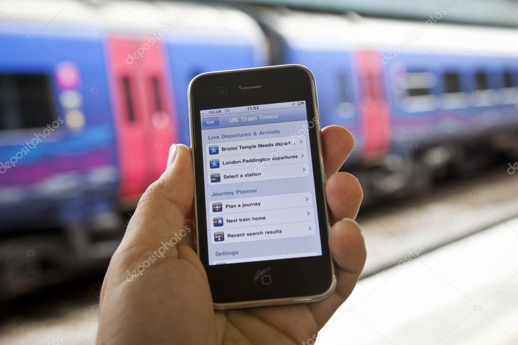 Using a UK Train Timetable App – Stock Editorial Photo © antb #22529115