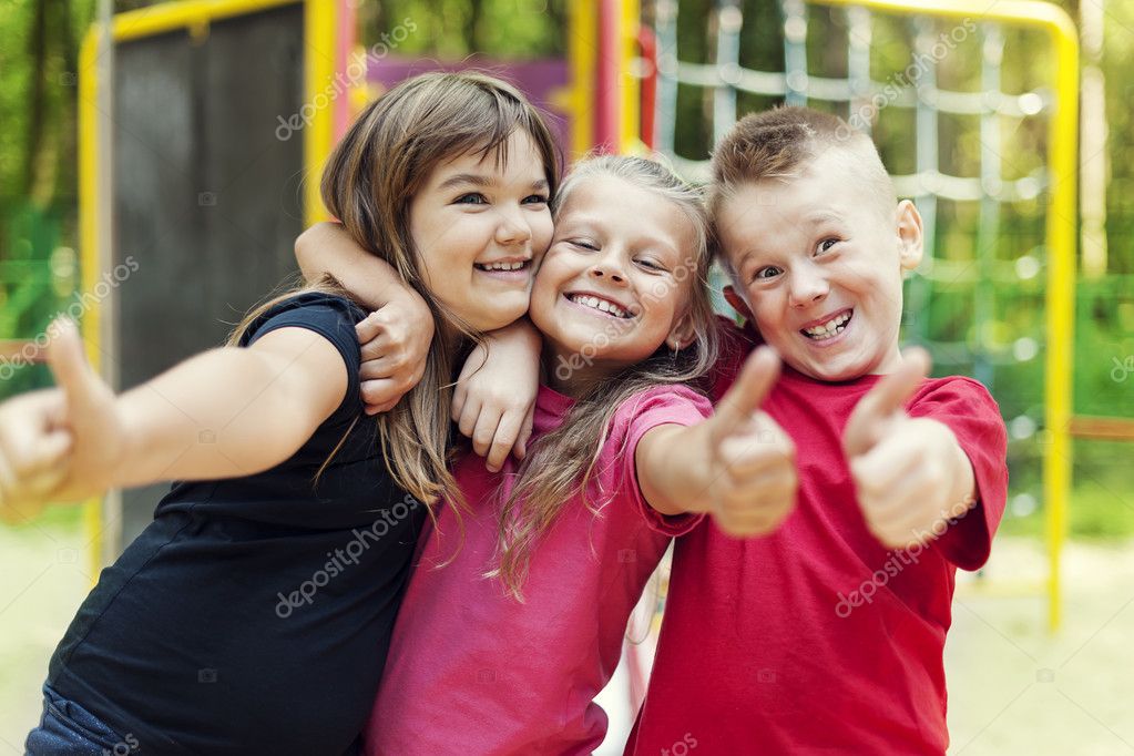 Children showing ok sign — Stock Photo © gpointstudio #21902689