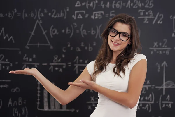 Female student thinking about mathematics problem Stock Photo by ...