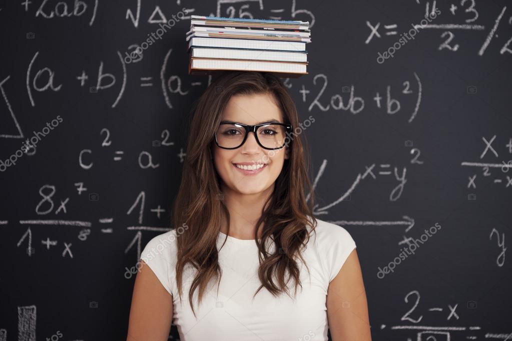 Female student thinking about mathematics problem Stock Photo by ...