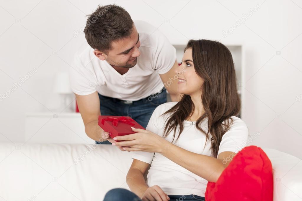 Man giving gift Stock Photo by ©gpointstudio 38464063