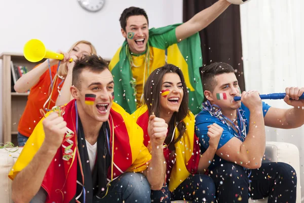 Friends supporting football team - Stock Image - Everypixel