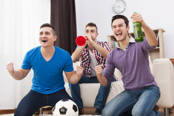 Friends supporting football team - Stock Image - Everypixel