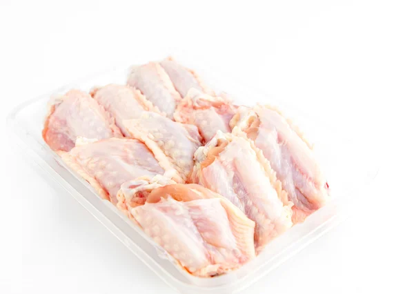 Fresh Chicken middle wings in package isolate — Stock Photo © Bunwit ...