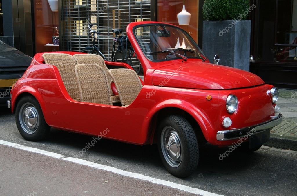 Classic little red italian car – Stock Editorial Photo © Mauvries #22339637