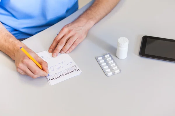 Doctor writing prescription - Stock Image - Everypixel