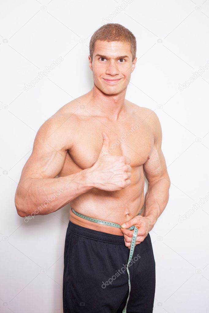Bodybuilder measuring torso — Stock Photo © jakubzak92 #44651937