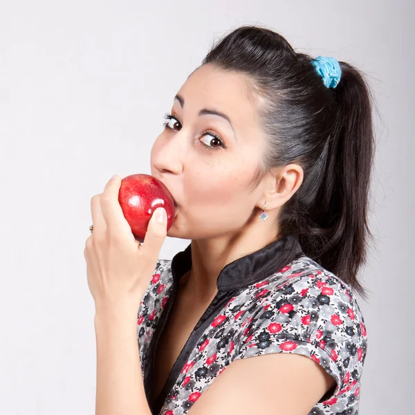woman eat red apple - Stock Image - Everypixel