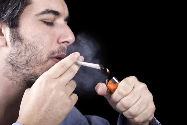 Adult Bum Smoking a Spliff Stock Photo by ©eldadcarin 22386145