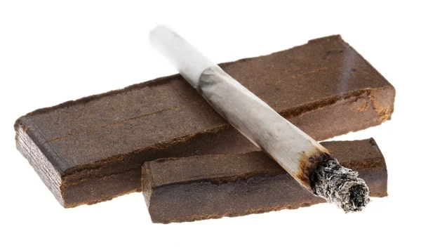Picture: lit joint | Lit Joint and Two Pieces of Hashish — Stock Photo ...